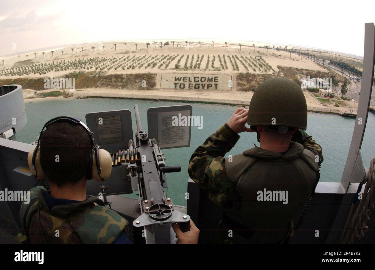 US Navy Sailors stationed aboard the Nimitz-class aircraft carrier USS ...