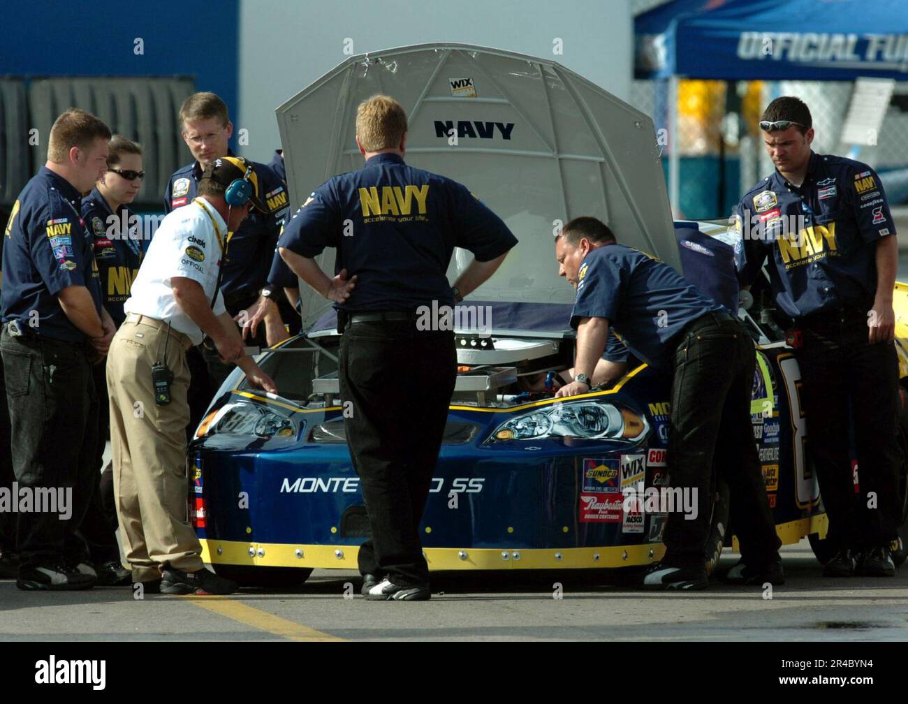 US Navy Members of JR Motorsports work on the No. 88 Navy Accelerate ...