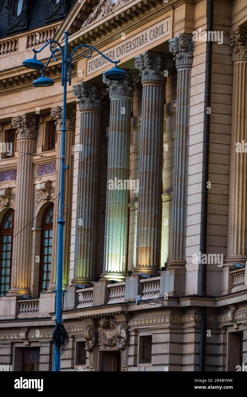 An image of an old French building featuring ornate white pillars and ...