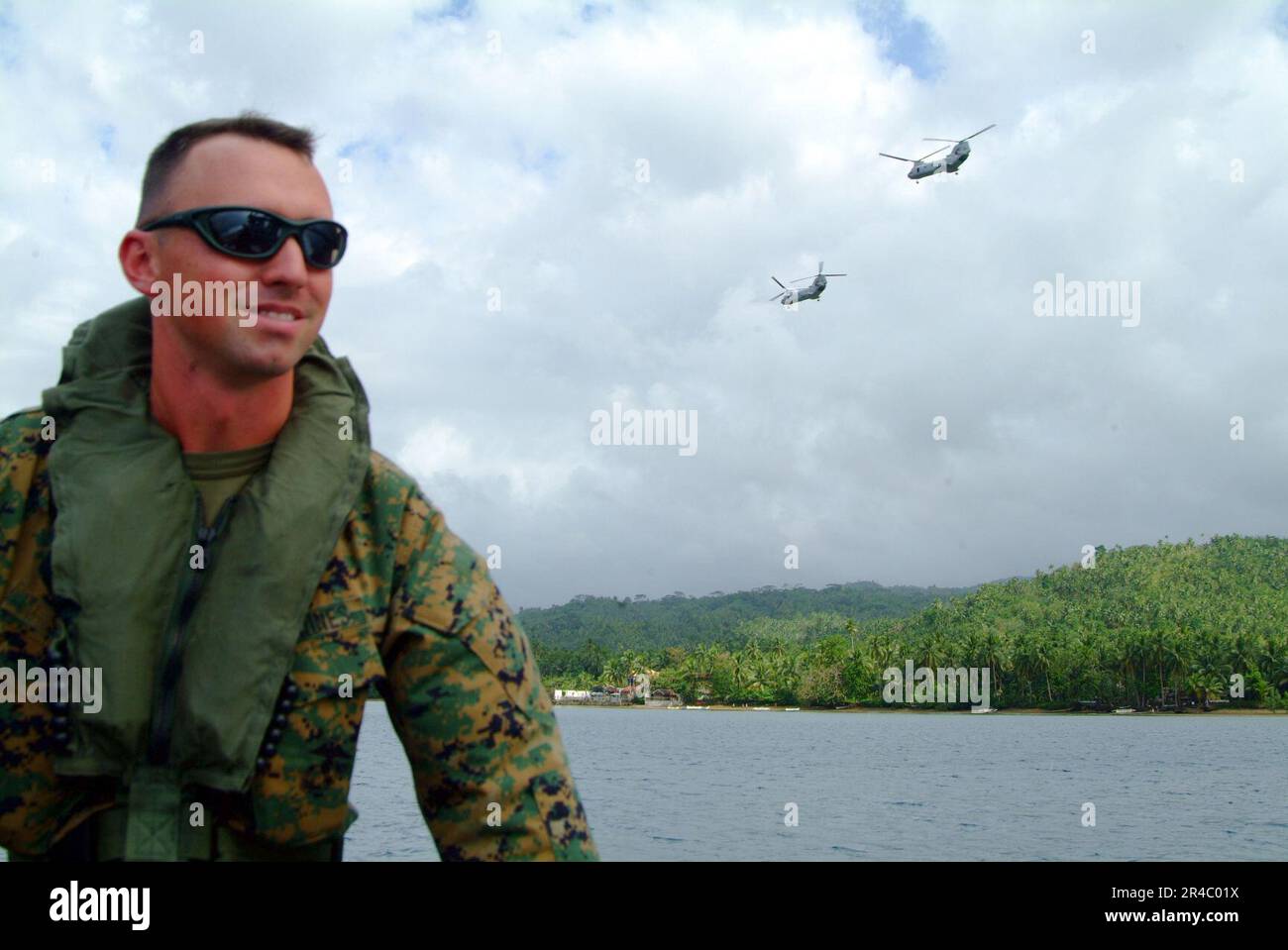 US Navy 31st Marine Service Support Group (MSSG) 1st Lt. surveys the ...