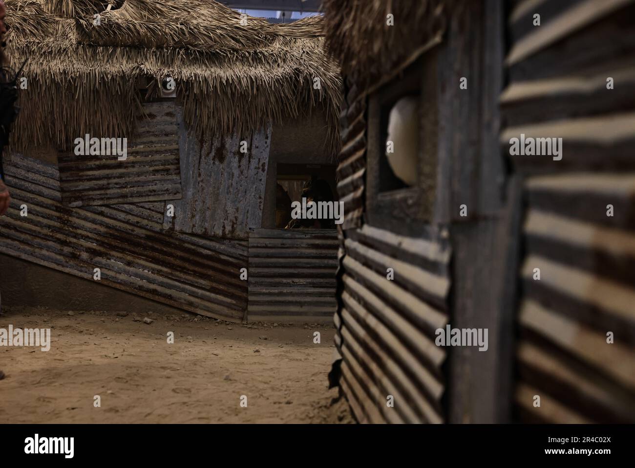 A U.S. Marine with India company, 3rd Battalion, 2nd Marines, posts a ...