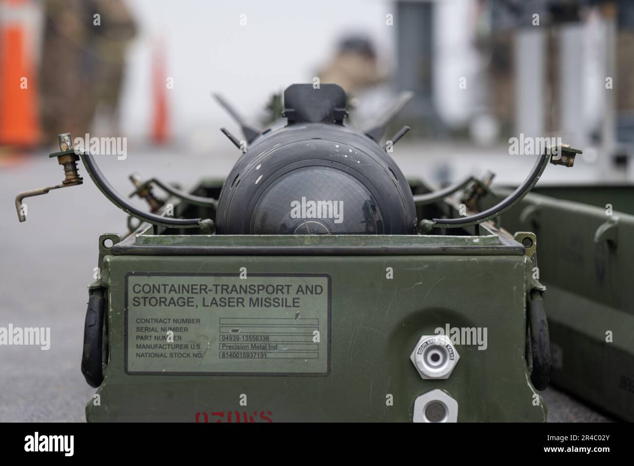 An AGM-114 Hellfire training missile sits in its container at a ...