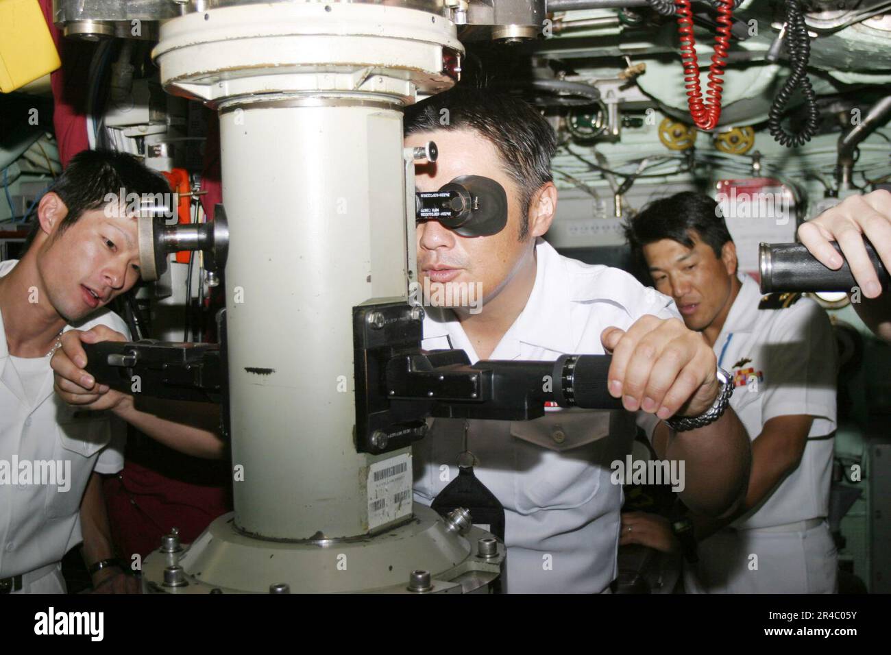 US Navy Japanese submarine JDS Oyashio (SS 590) crewmembers look ...