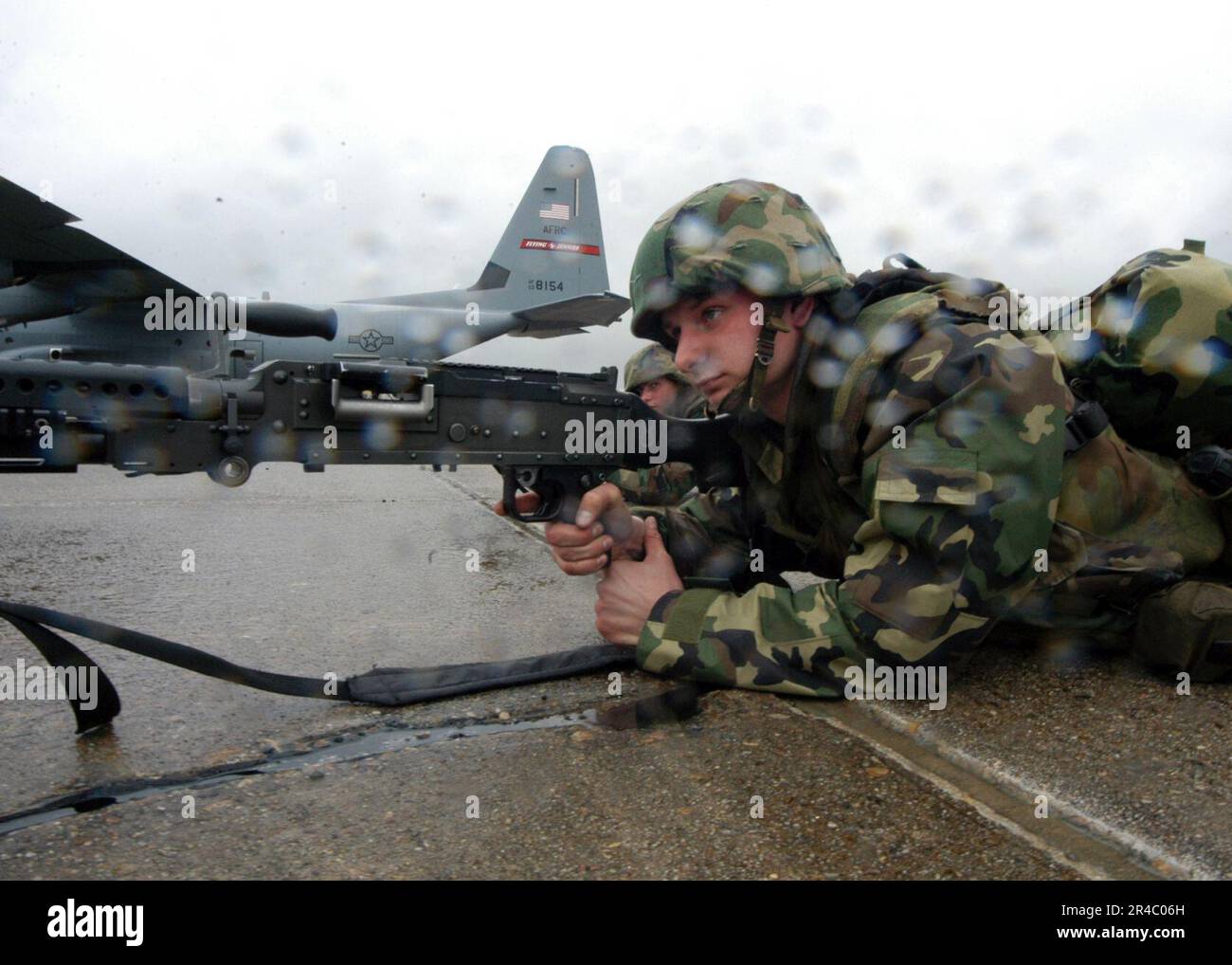 US Navy Builder 3rd Class assigned to Naval Mobile Construction ...