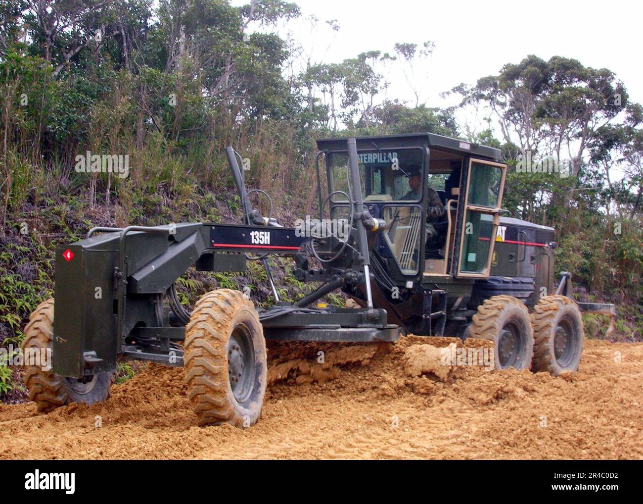 Us Navy Equipment Operator 3rd Class Assigned To Naval Mobile Construction Battalion Four Nmcb