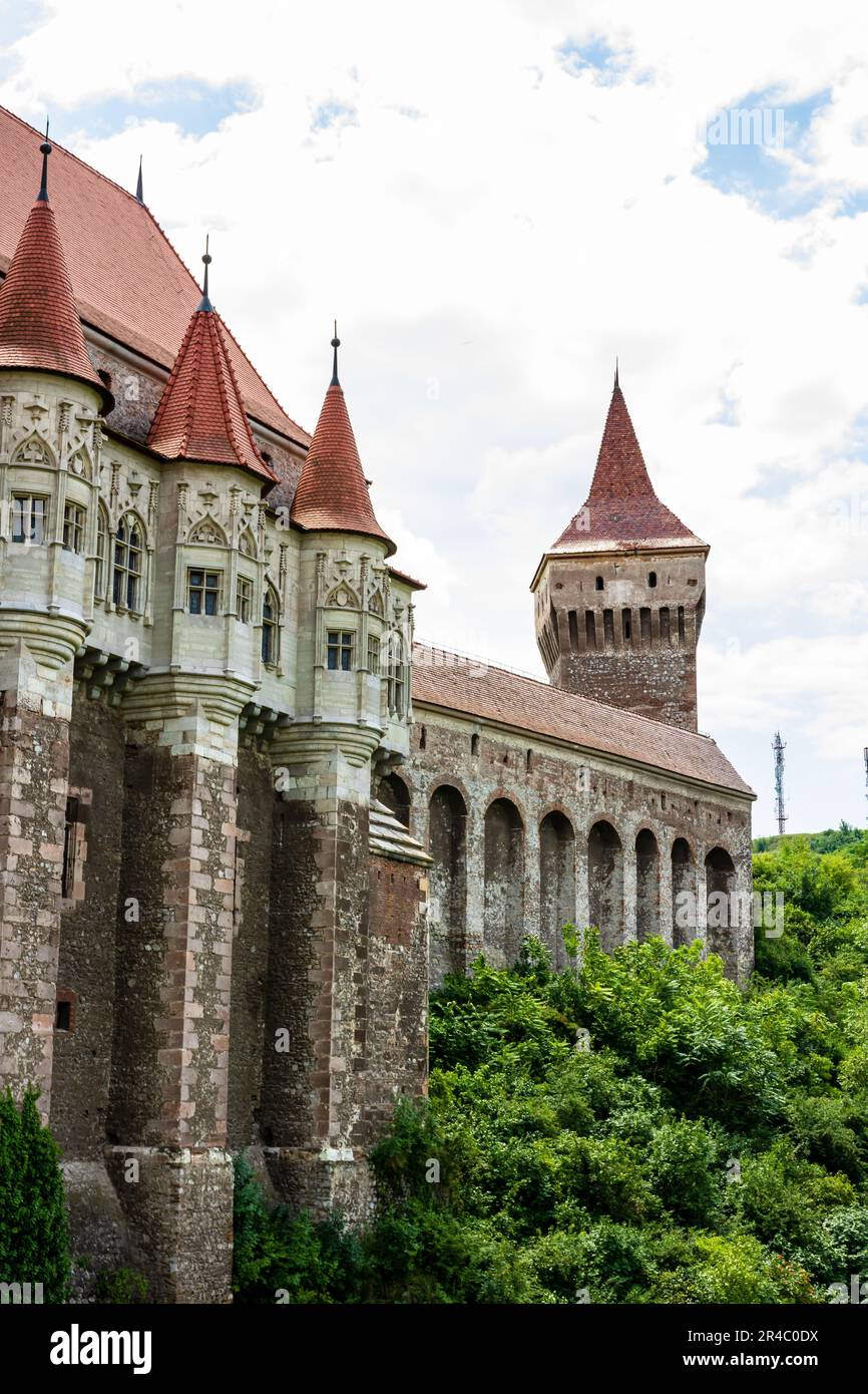 A contemporary-style skyscraper with two distinct towers and an ornate ...
