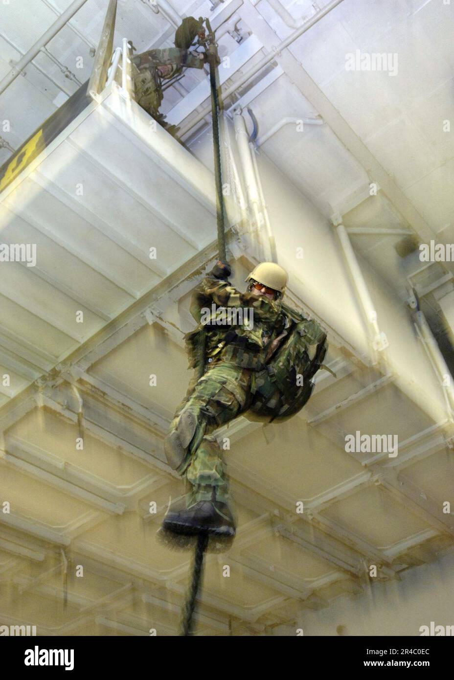 US Navy Corpsman 2nd Class a member of Explosive Ordnance Disposal Team ...