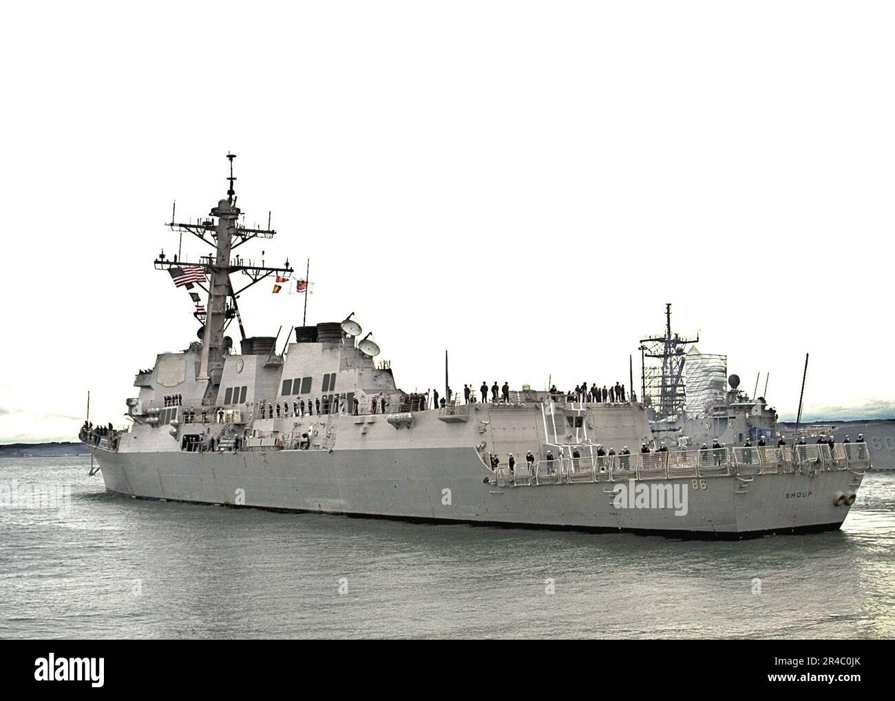US Navy Sailors stationed aboard the guided missile destroyer USS Shoup ...