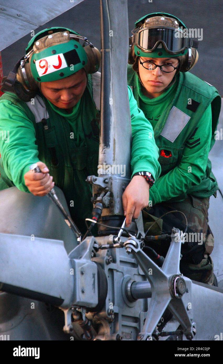 US Navy aviation machinist's mates assigned to Helicopter Anti ...
