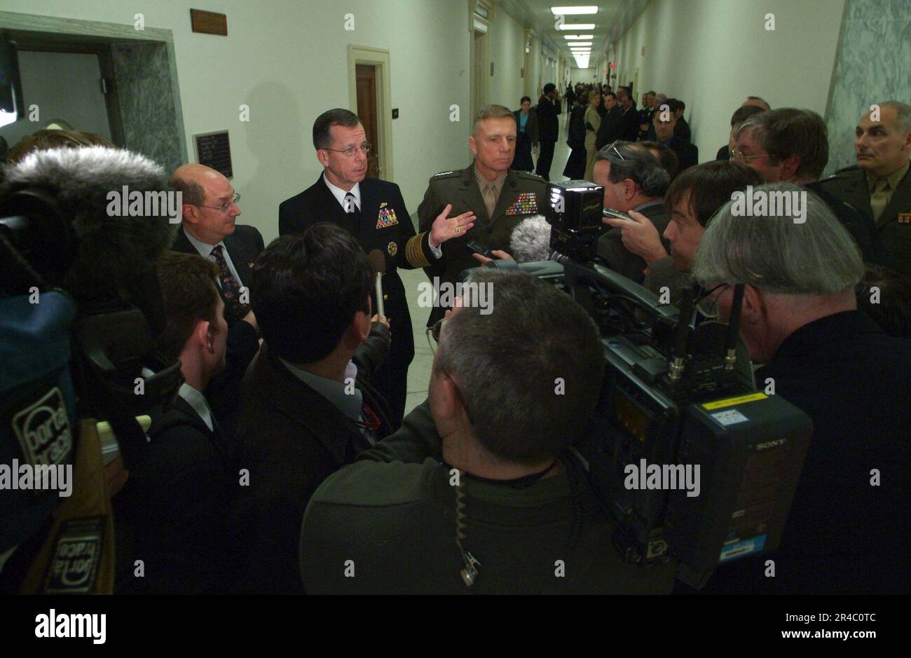 US Navy Chief of Naval Operations (CNO) Adm. Mike Mullen, center ...
