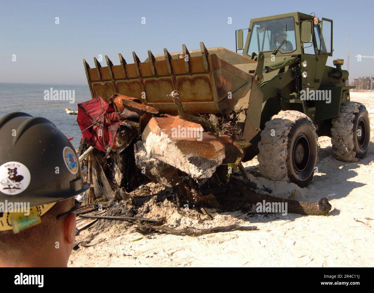 Us Navy Equipment Operator 3rd Class Assigned To Naval Mobile Construction Battalion Seven Four