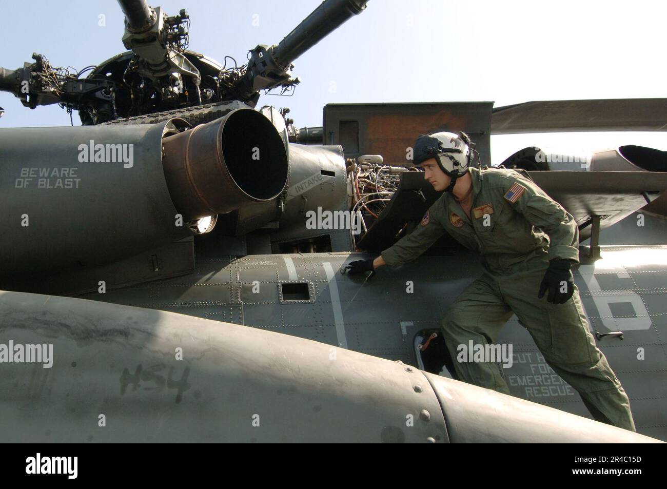 US Navy Lt. j.g. a pilot assigned to the Blackhawks of Helicopter Mine ...