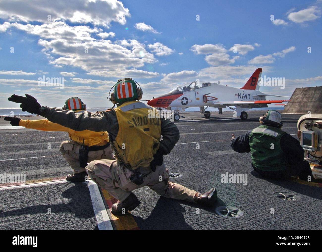 US Navy Lt. signal to the deck edge operator that the T-45A Goshawk is ...