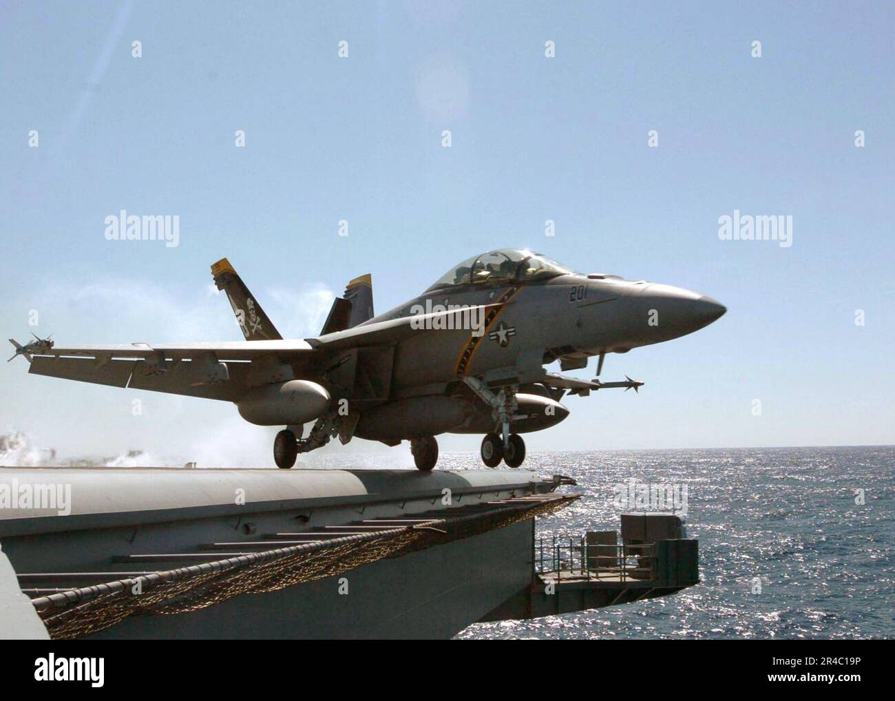 US Navy An F-A-18 Super Hornet launches from the flight deck aboard the ...