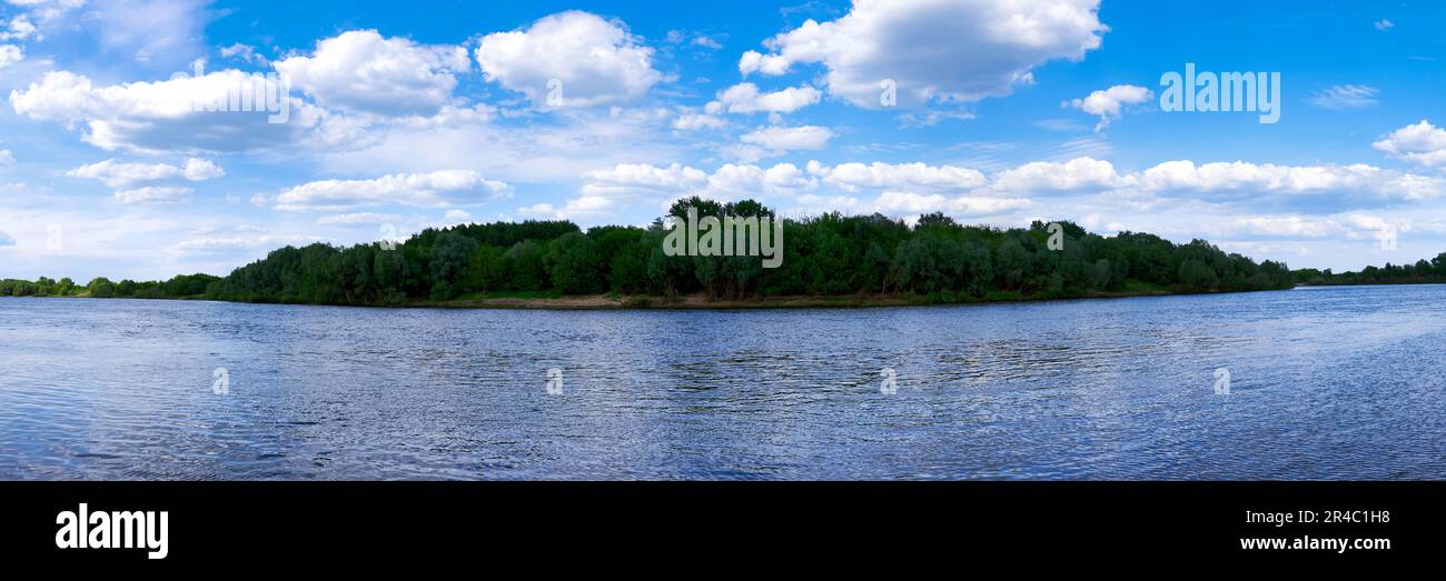 Panorama of the Oka River. Panoramic view of the island with green ...