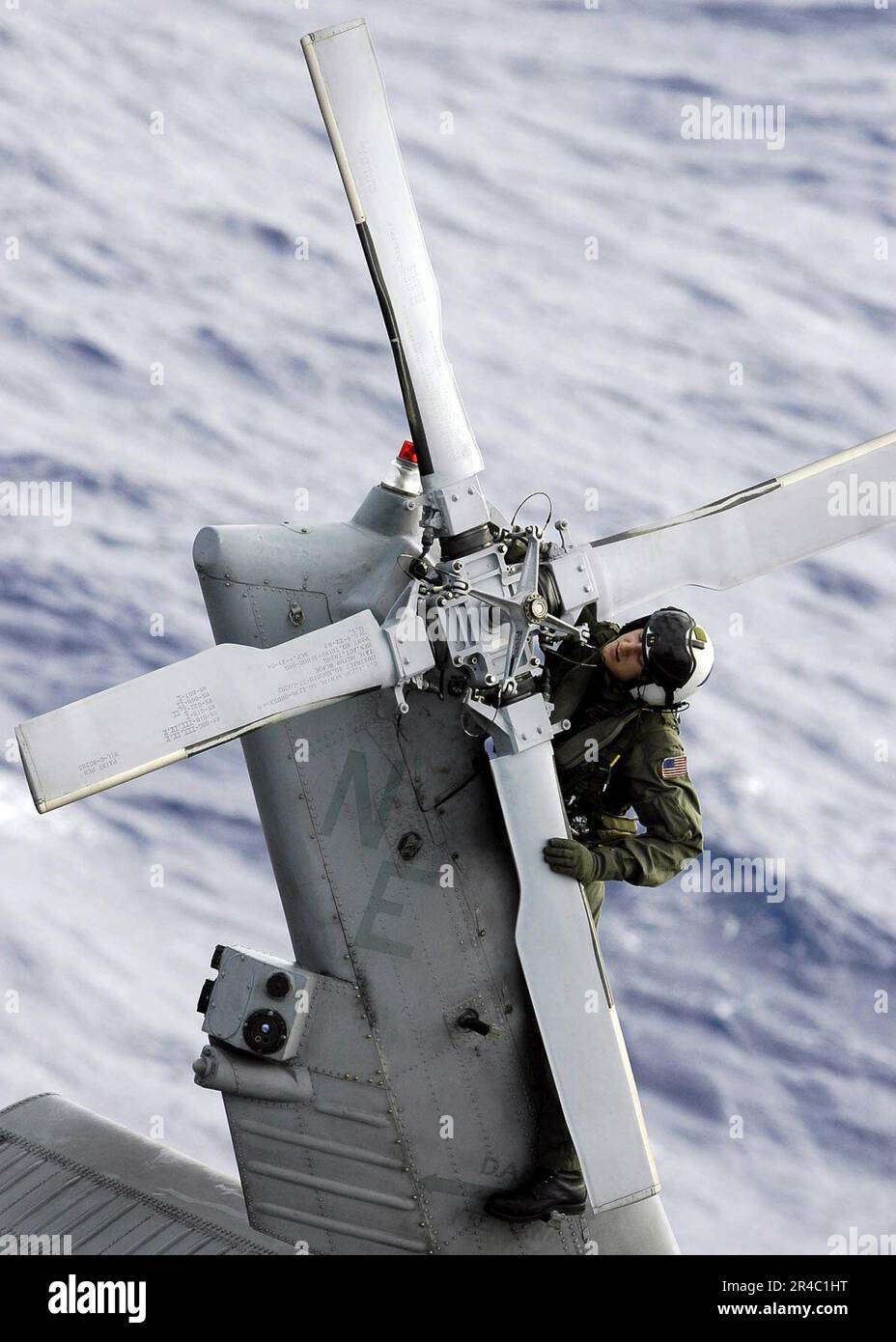 US Navy A crew member assigned to the Stock Photo - Alamy