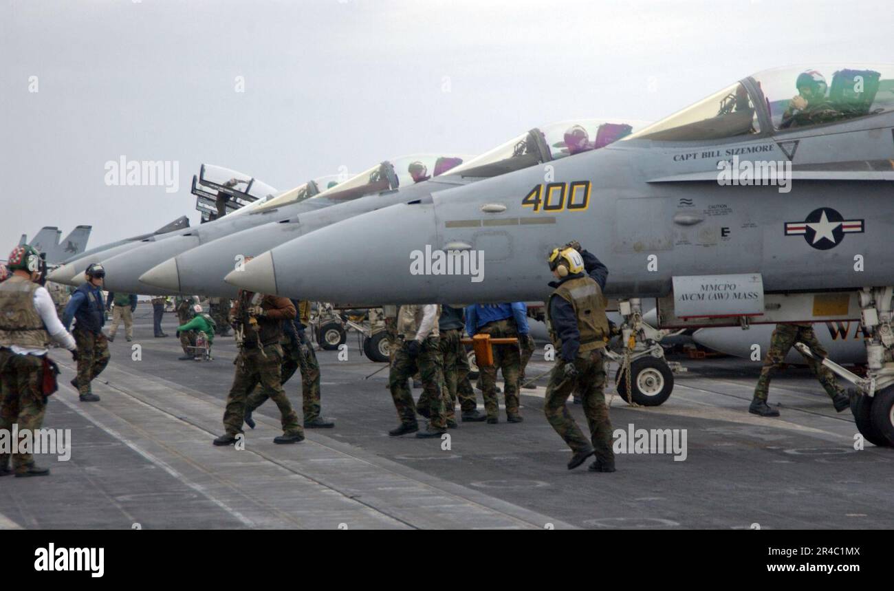 US Navy F-A-18C Hornets assigned to the Golden Warriors of Strike ...