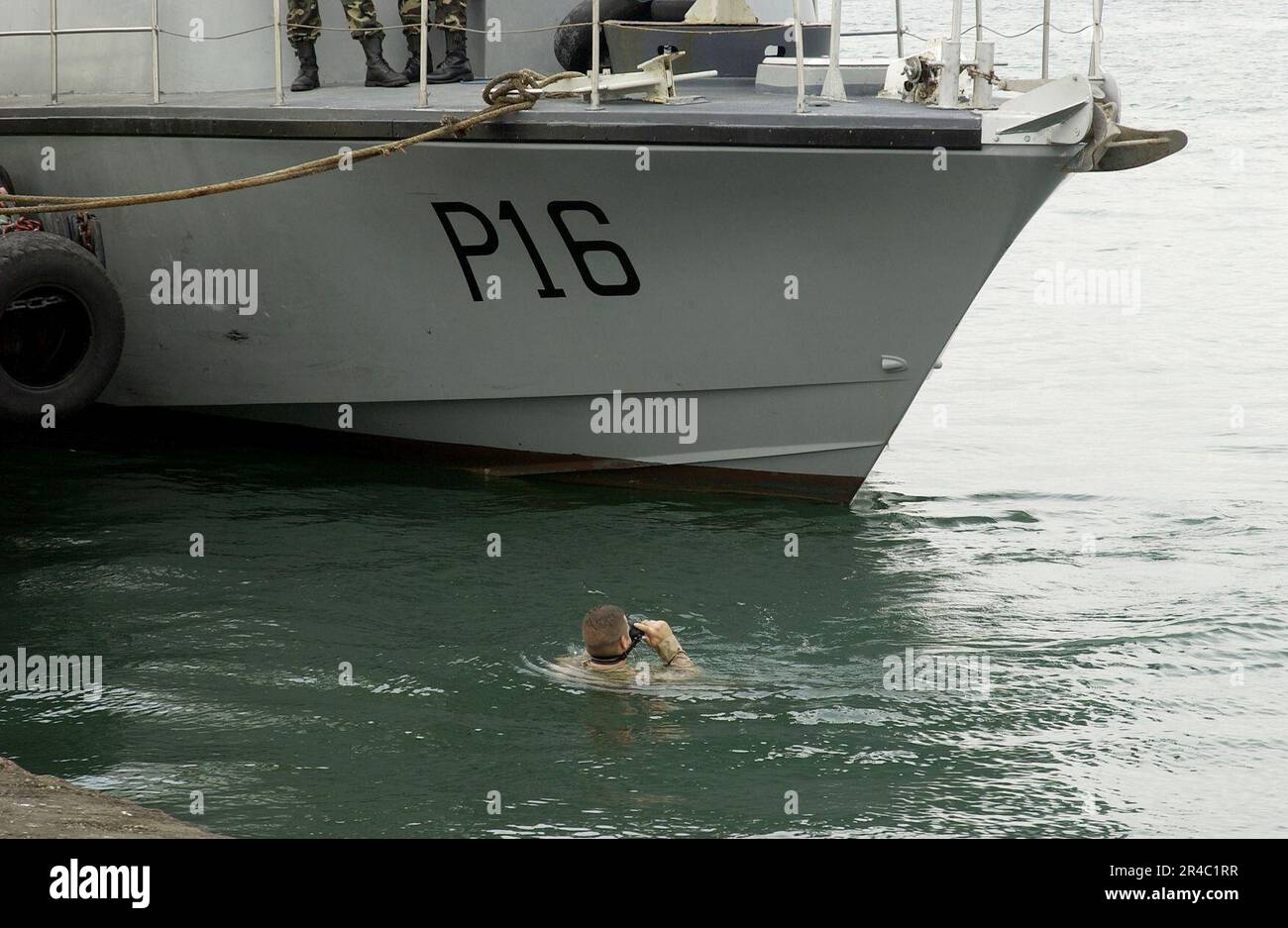 US Navy A U.S. Navy explosive ordnance disposal (EOD) Sailor performs a ...