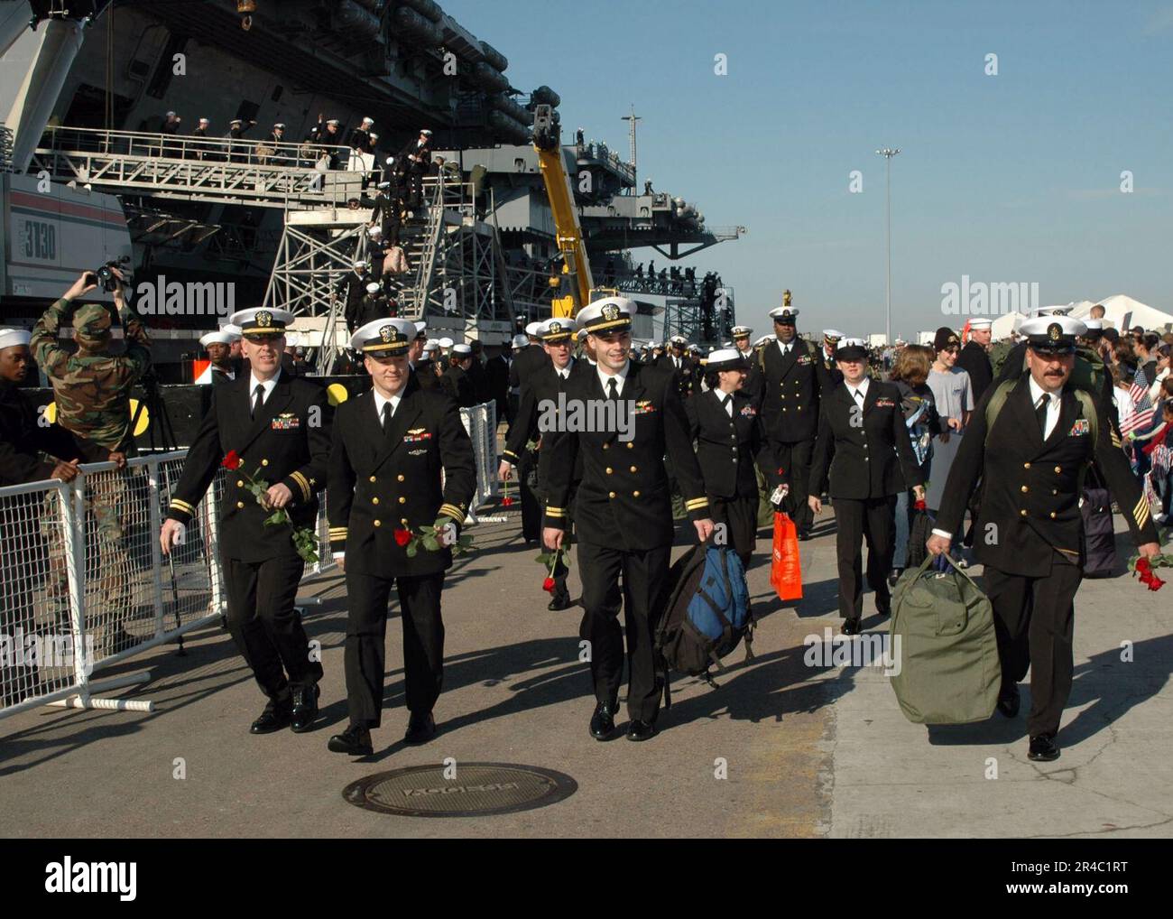 US Navy Sailors assigned to the Nimitz-class aircraft carrier USS Theodore Roosevelt (CVN 71 ...