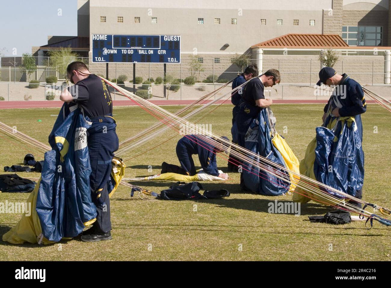 US Navy U.S. Navy Parachute Team Leap Frogs crew members repack their ...