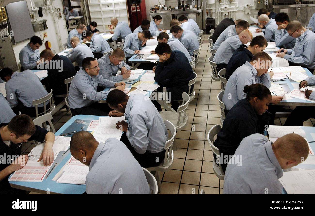 US Navy Sailors aboard the Nimitz-class aircraft carrier USS Abraham ...