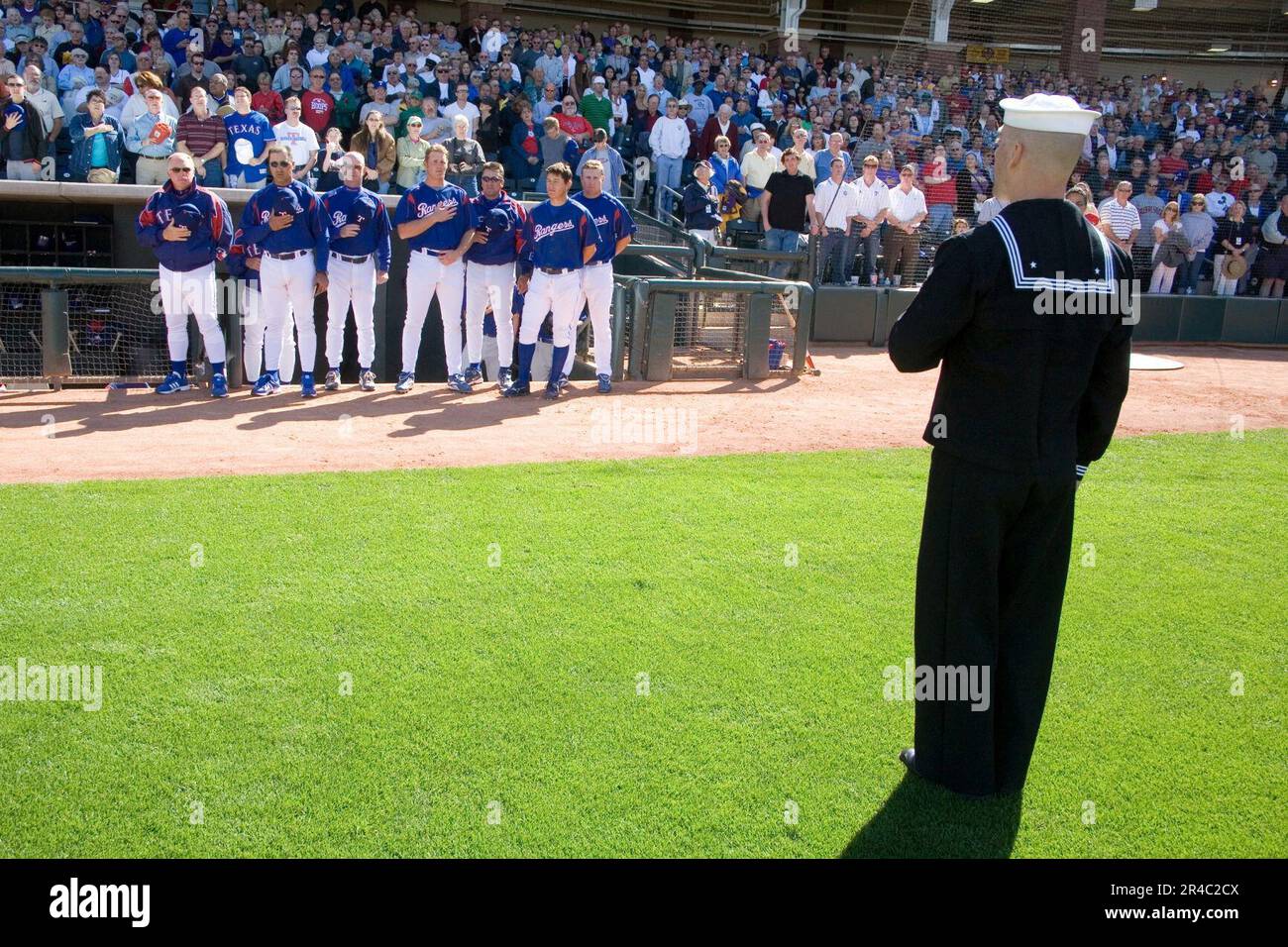 US Navy Journalist 1st Class sings God Bless America, during the 7th ...