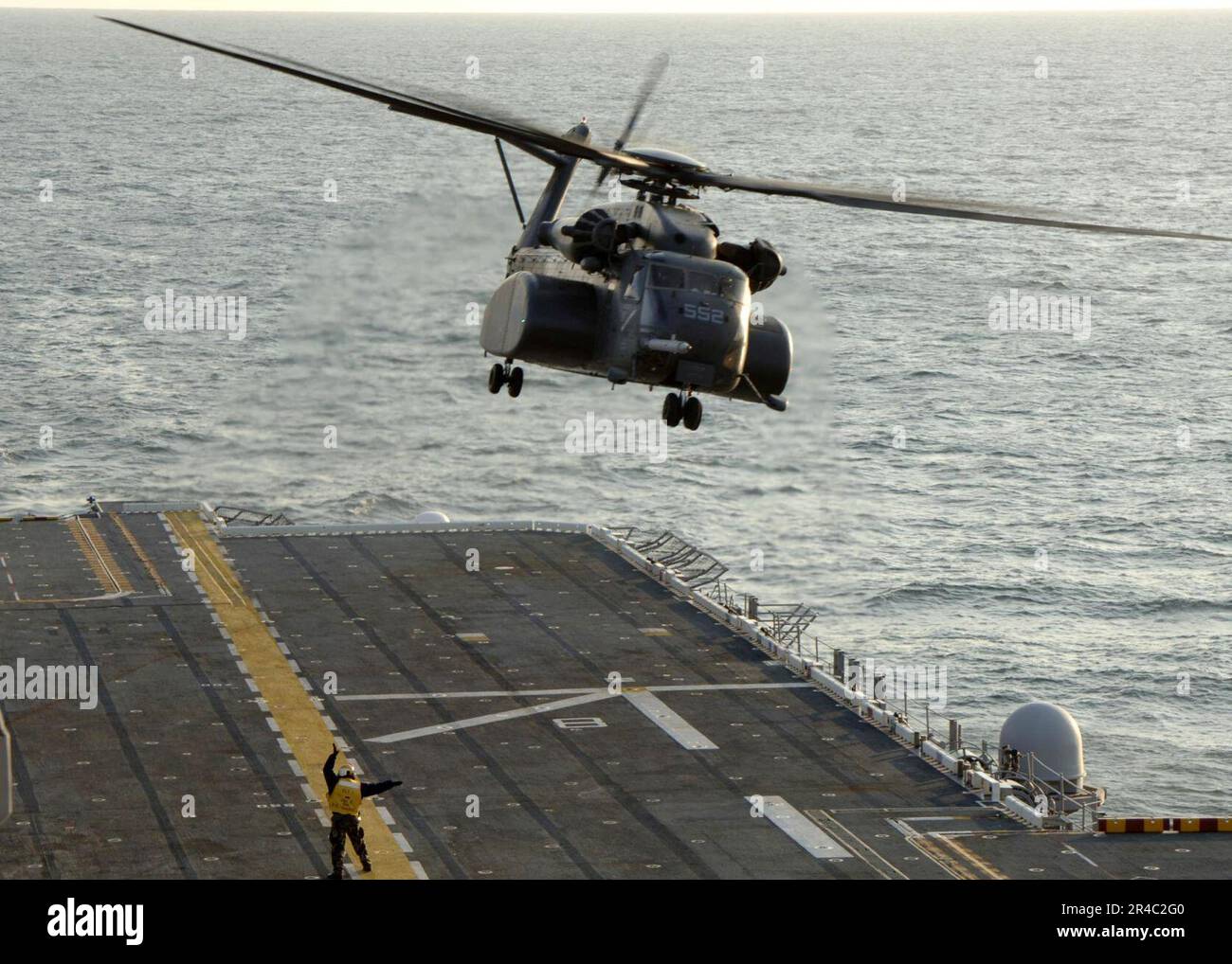 US Navy A MH-53E Sea Stallion helicopter assigned to Helicopter Mine ...