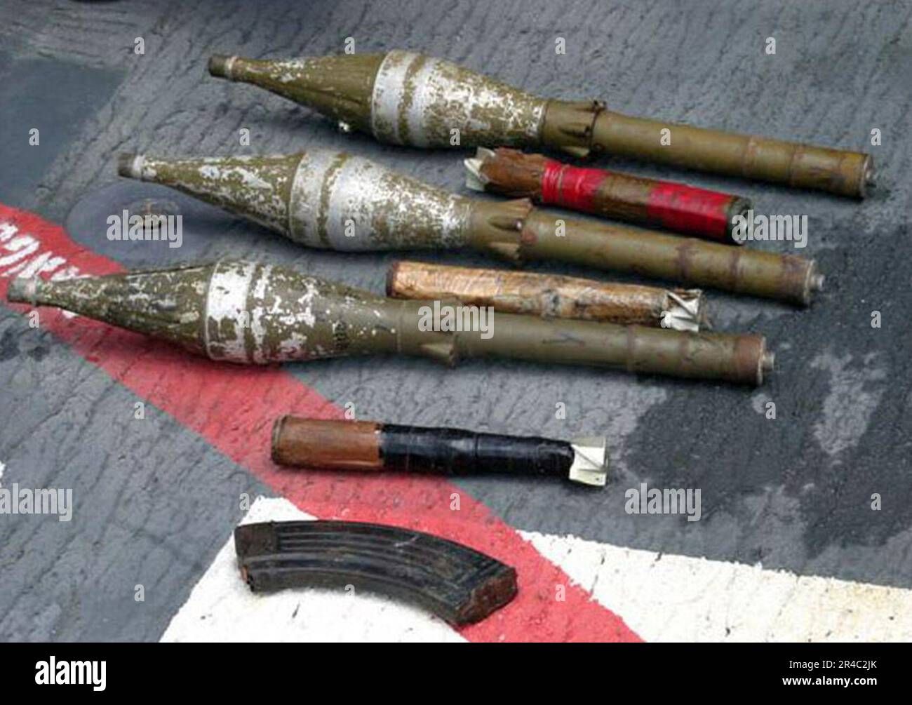 US Navy Rocket propelled grenades (RPGs) and other armaments lay on the ...