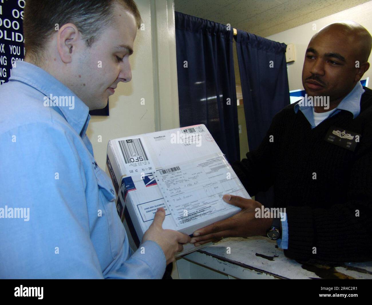 US Navy Postal Clerk 1st Class Leading Petty Officer (LPO) of the ...