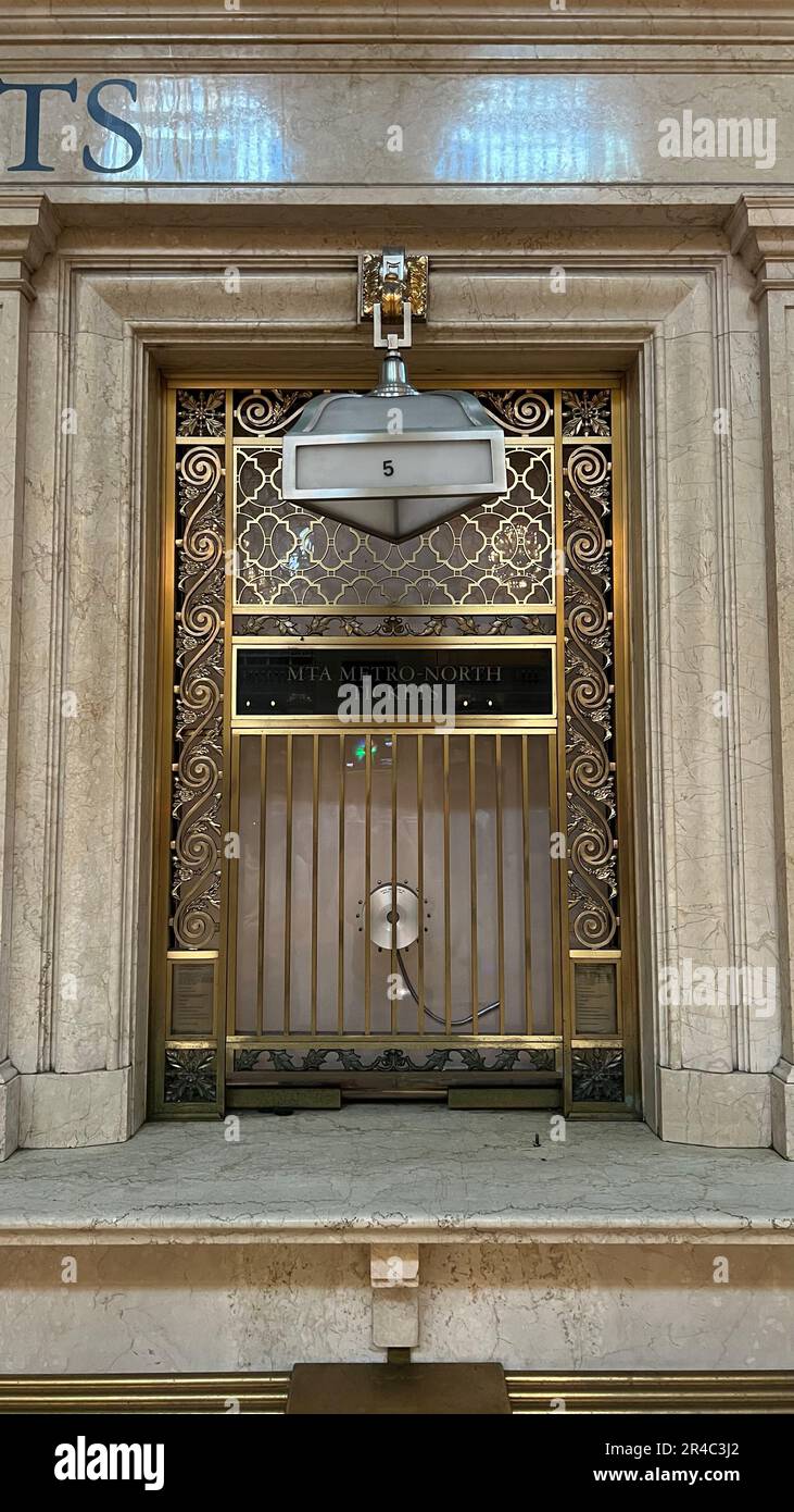 A high-angle view of a classic building entrance featuring a clock ...