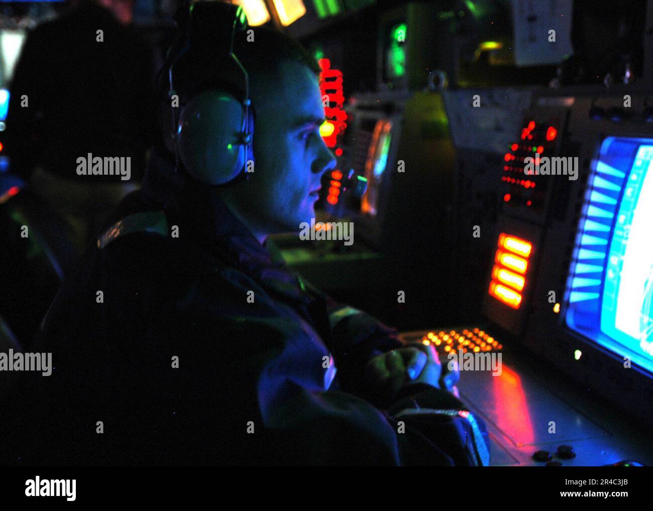 US Navy Fire Controlman 2nd Class stands watch in the Combat ...