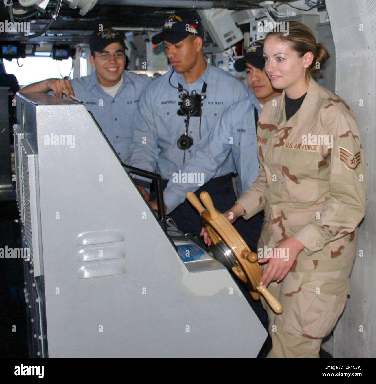 US Navy Staff Sgt. steer the Nimitz-class aircraft carrier USS Ronald ...