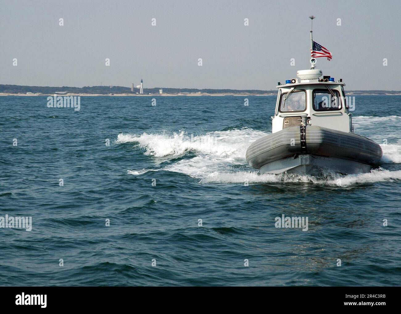 US Navy A 10-meter Rigid Hull Inflatable Boat (RHIB), provides security ...