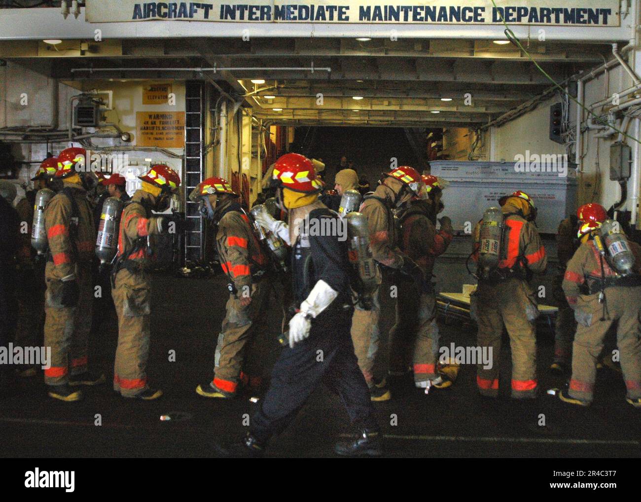 US Navy During a fire drill on board the amphibious assault ship USS ...