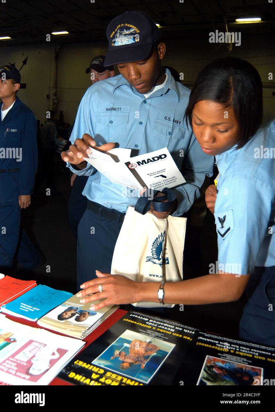US Navy Seaman Apprentice left, and Hospital Corpsman 3rd Class review ...