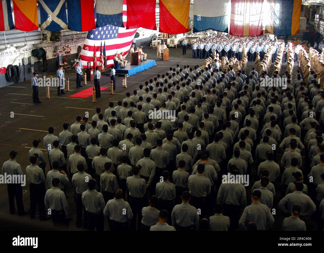 US Navy Amphibious assault ship USS Nassau (LHA 4) crew members stand ...