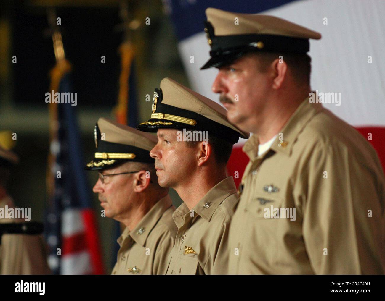 US Navy Amphibious assault ship USS Nassau (LHA 4) crew members stand ...