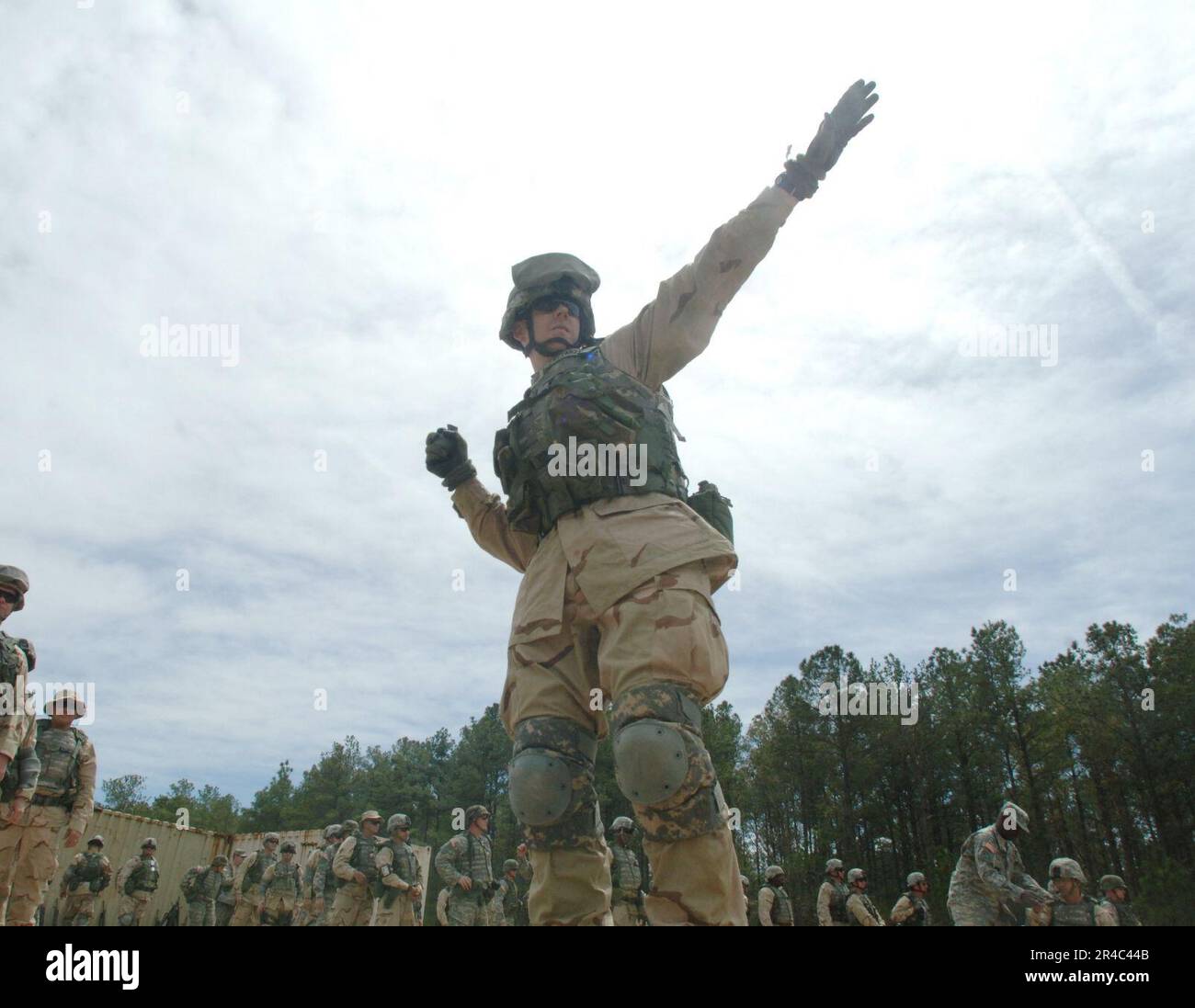 US Navy A Sailor launches a hand grenade during the Navy's Individual ...