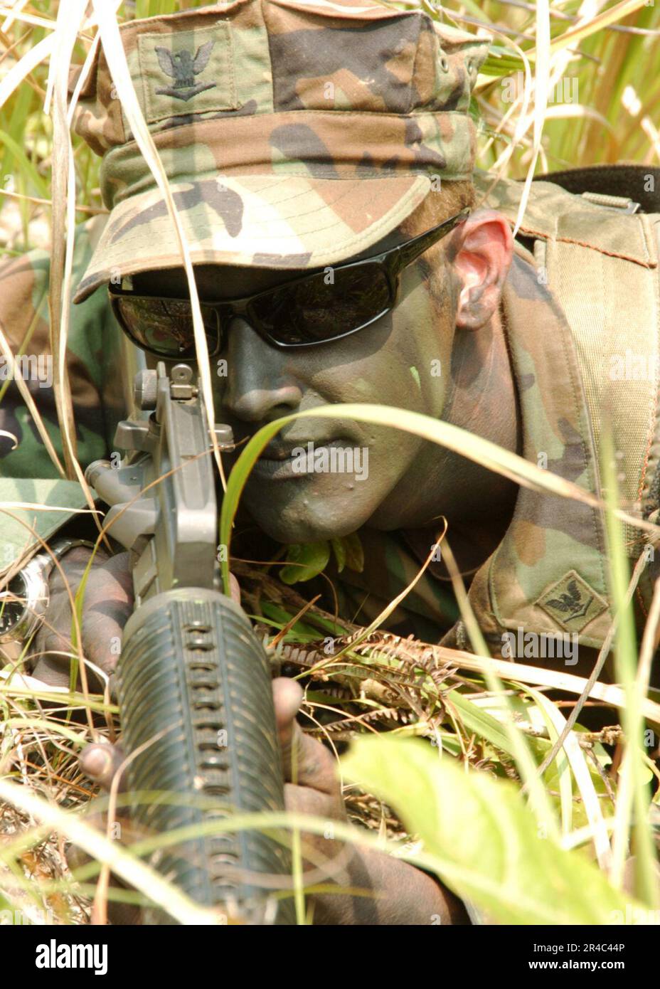 US Navy Builder 3rd Class of Naval Mobile Construction Battalion Four ...