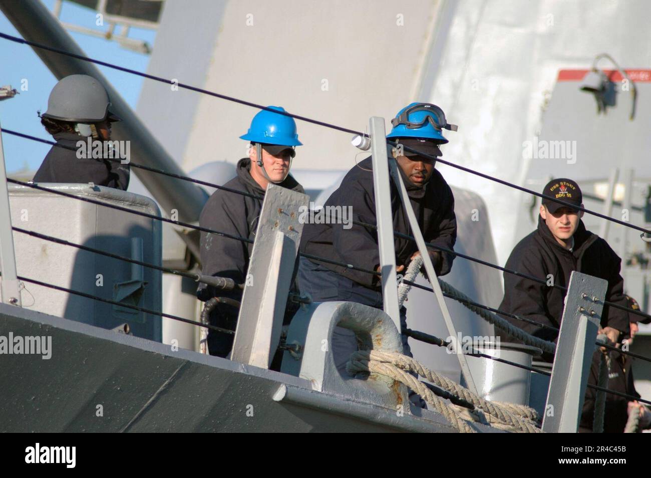 US Navy Sailors stationed aboard the guided-missile destroyer USS Stout ...