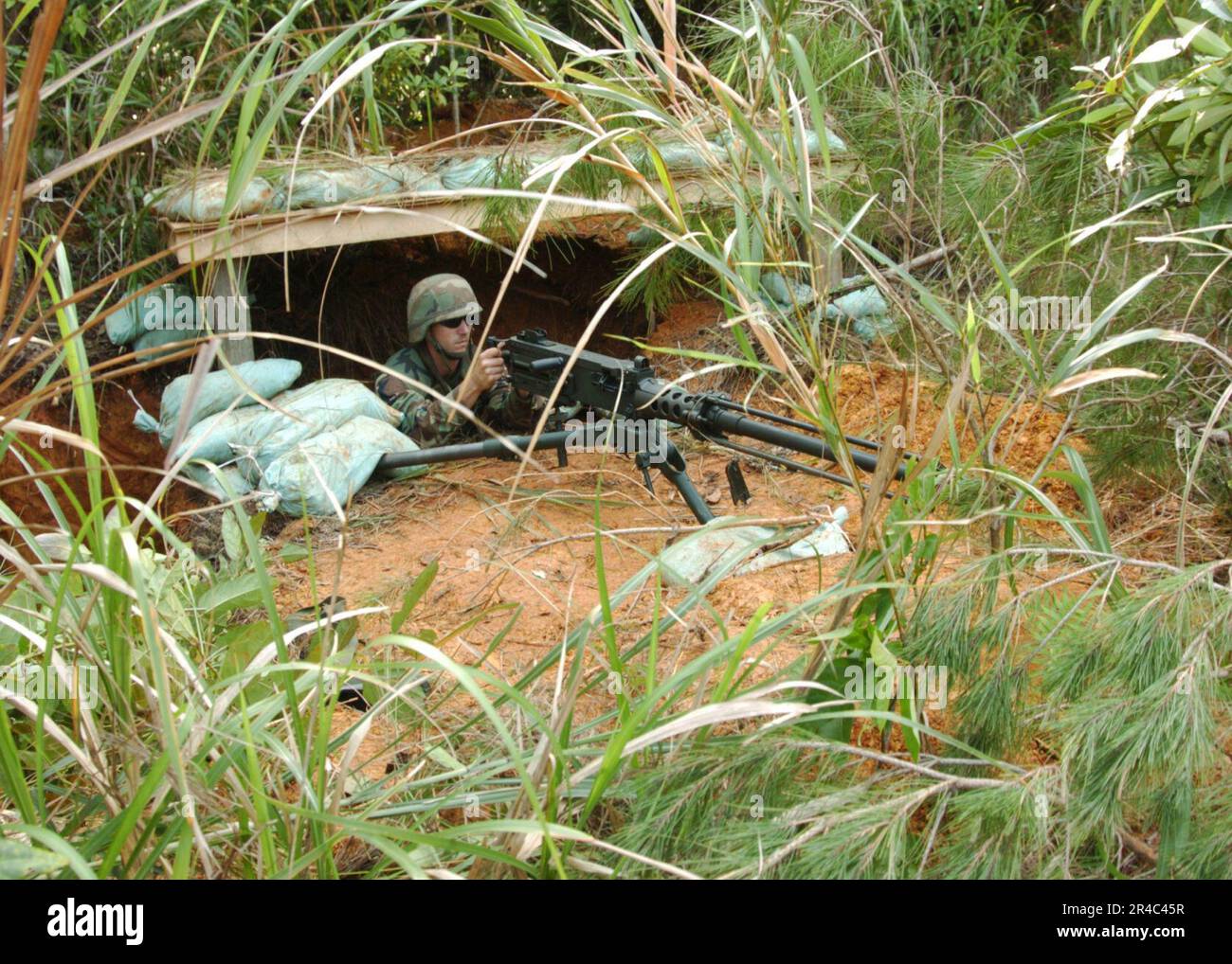 US Navy Builder 3rd Class of Naval Mobile Construction Battalion Four ...