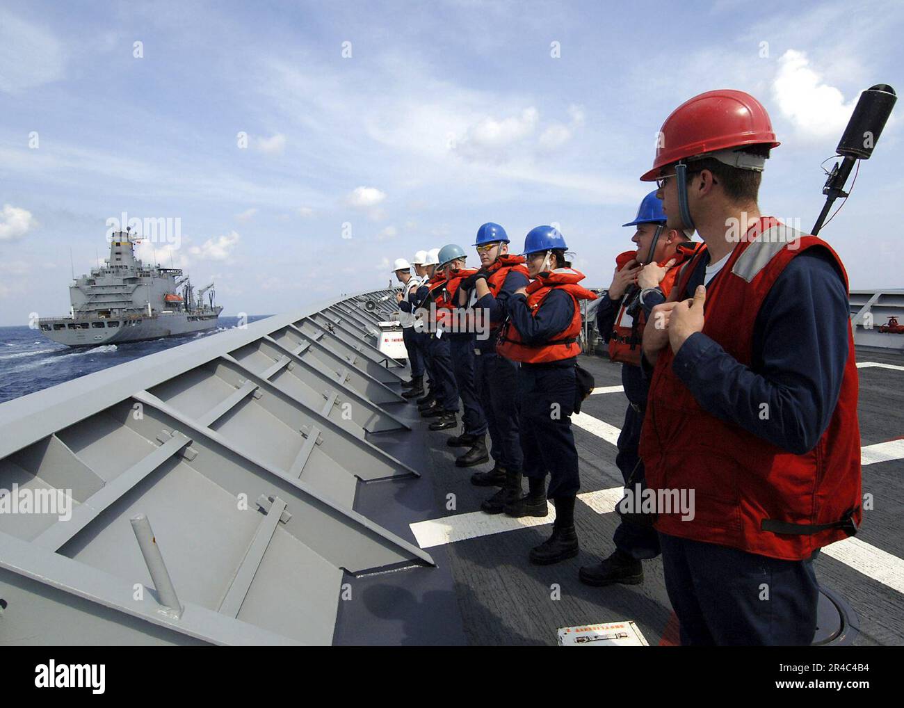 US Navy Sailors aboard the Ticonderoga-class guided missile Cruiser USS ...