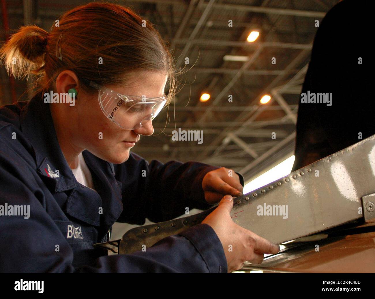 US Navy Aviation structural Mechanic 3rd Class assigned to the Stock ...