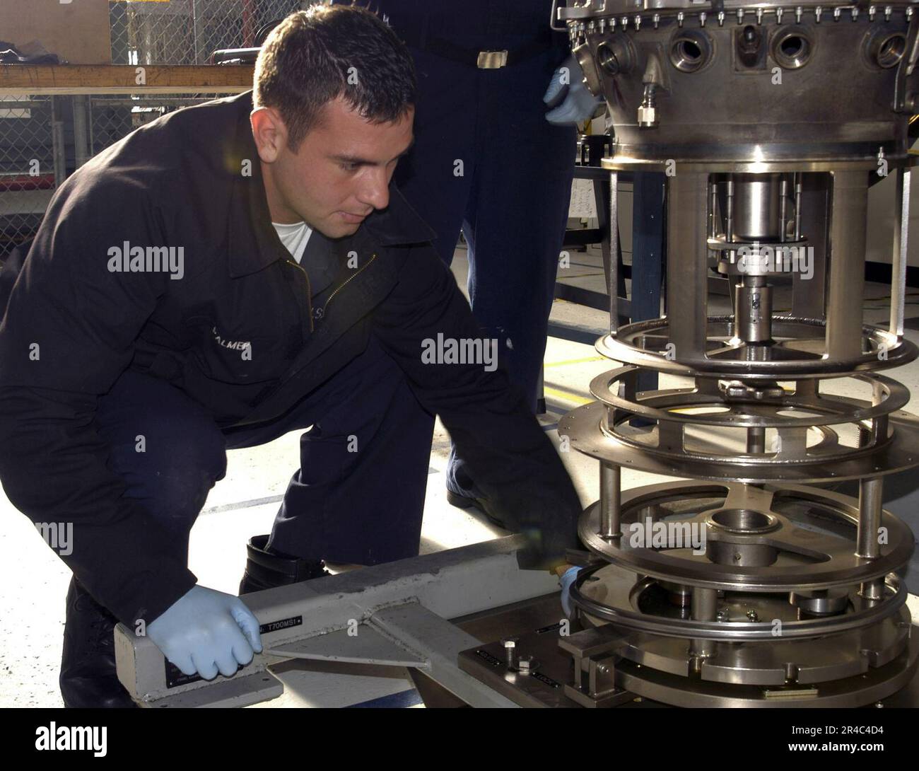 US Navy Aviation Machinist's Mate Airman assigned to Aviation ...