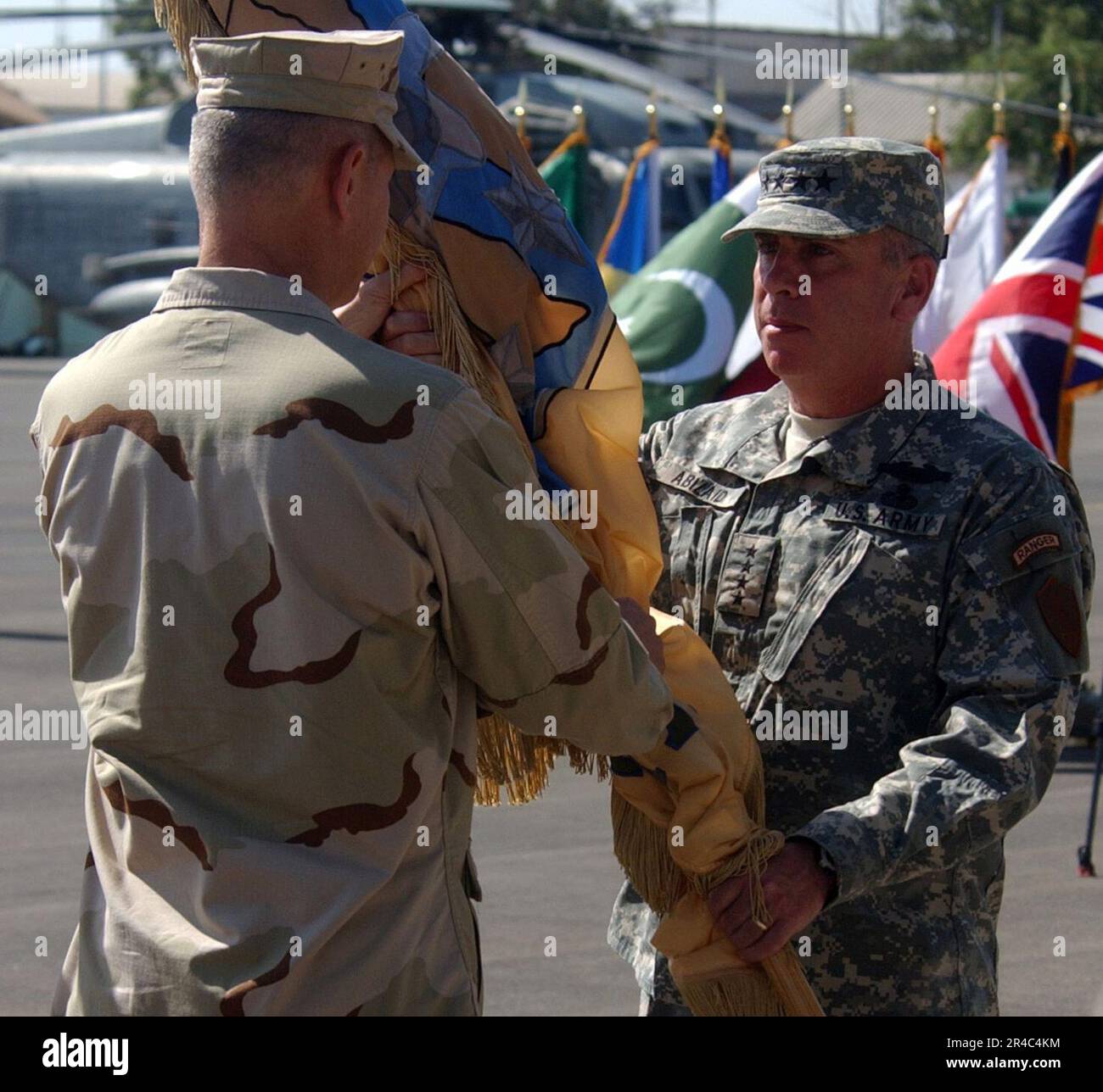 US Navy Rear Adm. Richard W. Hunt accepts the Combined Joint Task Force ...
