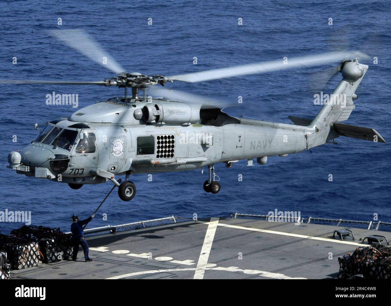 US Navy An SH-60B Seahawk helicopter assigned to the Saberhawks of ...