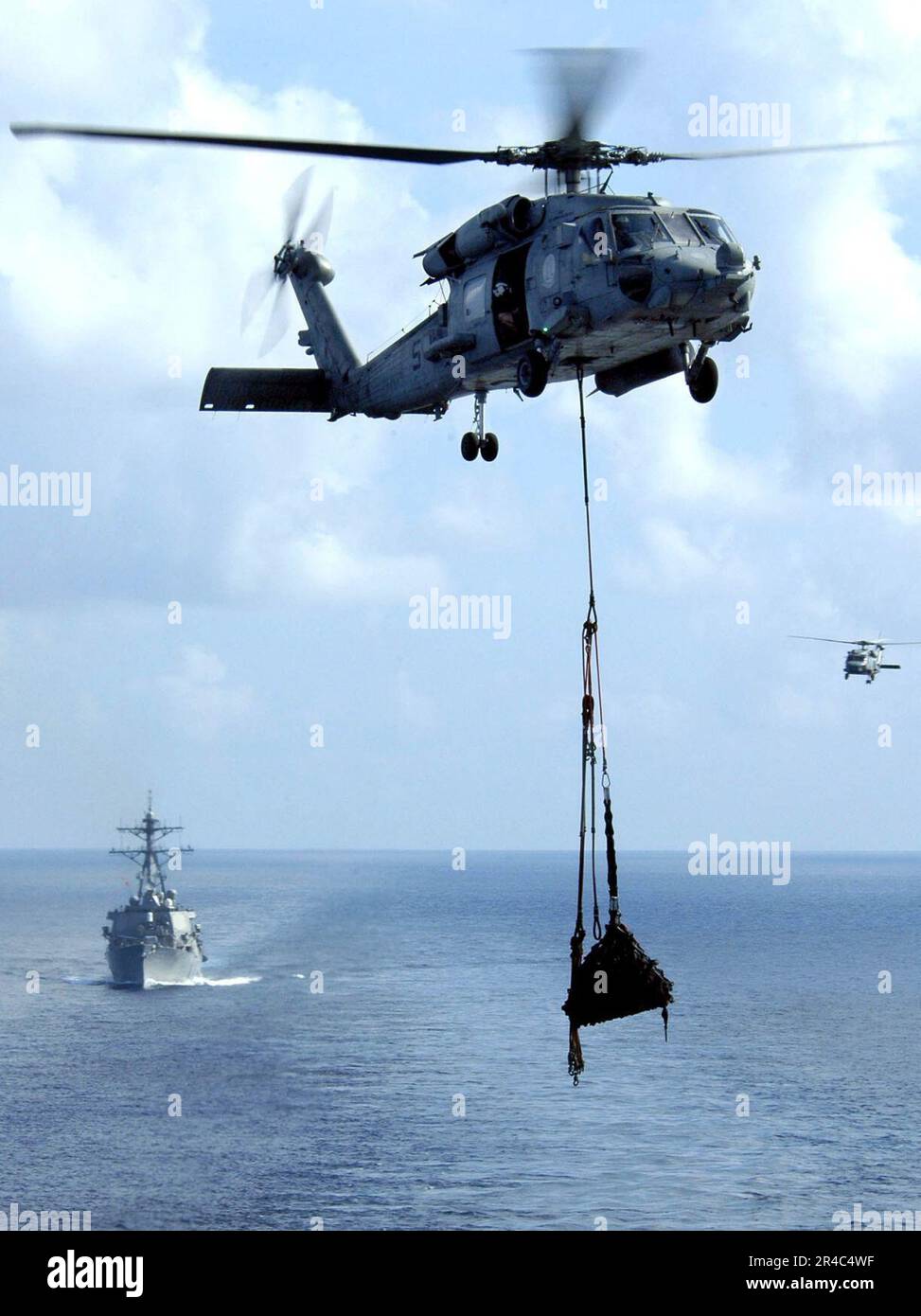 US Navy A pair of SH-60B Seahawk helicopters assigned to the Saberhawks ...