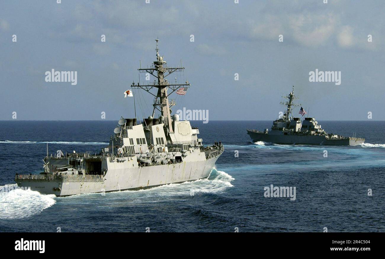 US Navy USS Shoup (DDG 86), right, and USS Russell (DDG 59) take part ...