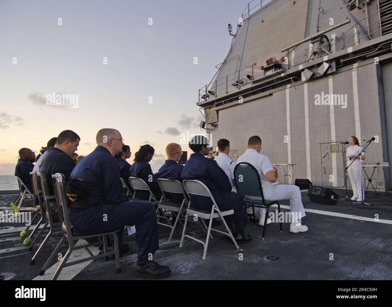 US Navy Sailors enjoy an Easter morning sunrise service on the flight ...