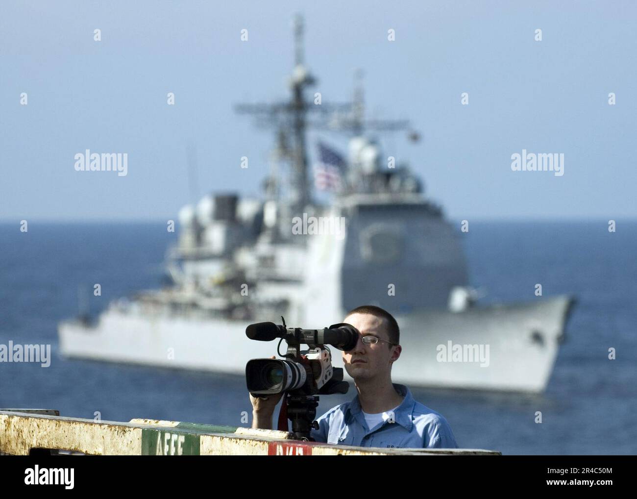 US Navy Journalist 2nd Class shoots video on the flight deck of the ...